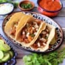 Slow Cooker Guajillo Pork Tacos - Mamá Maggie's Kitchen